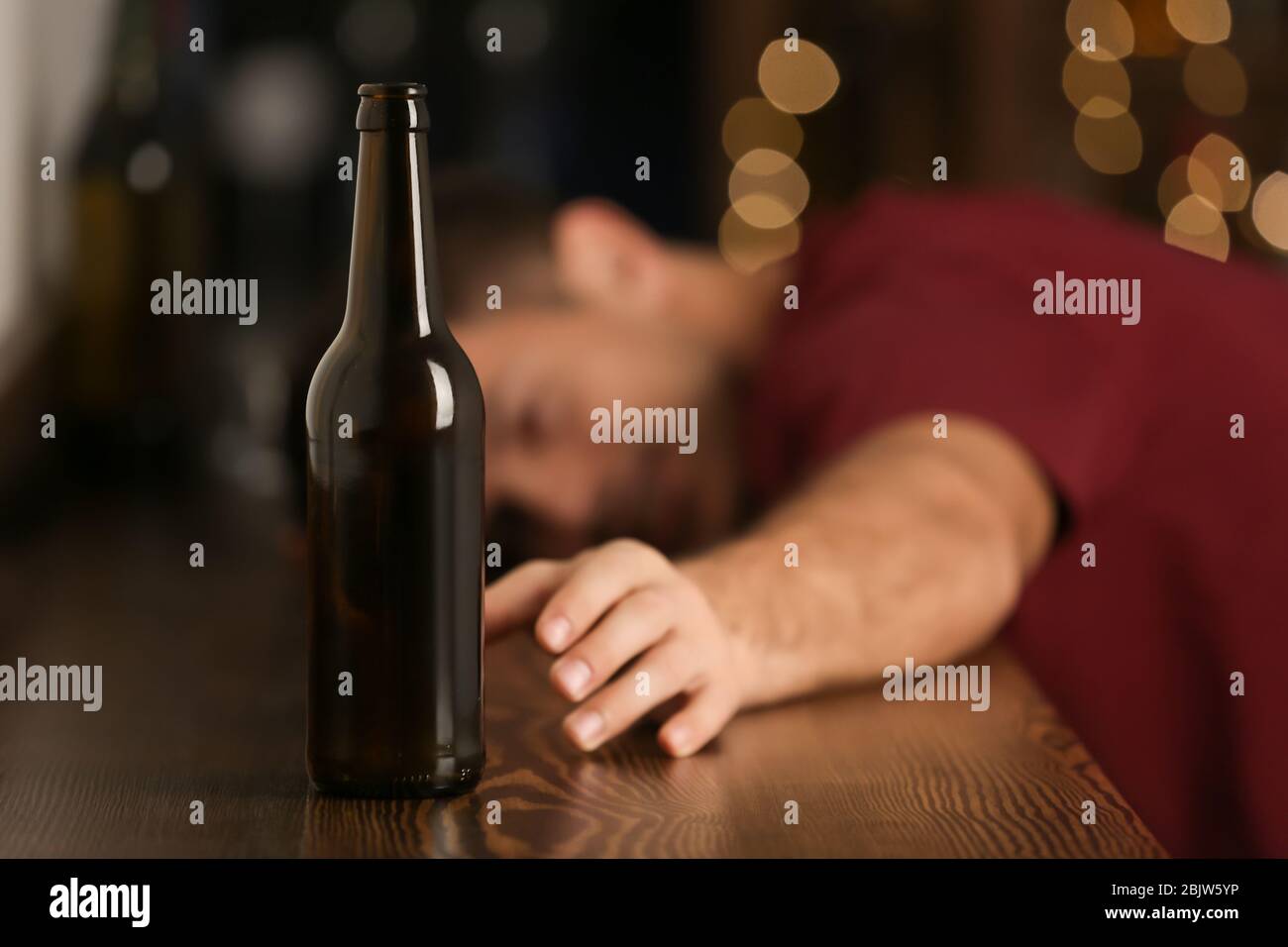 Hand reaching glass alcoholic drink hi-res stock photography and images ...