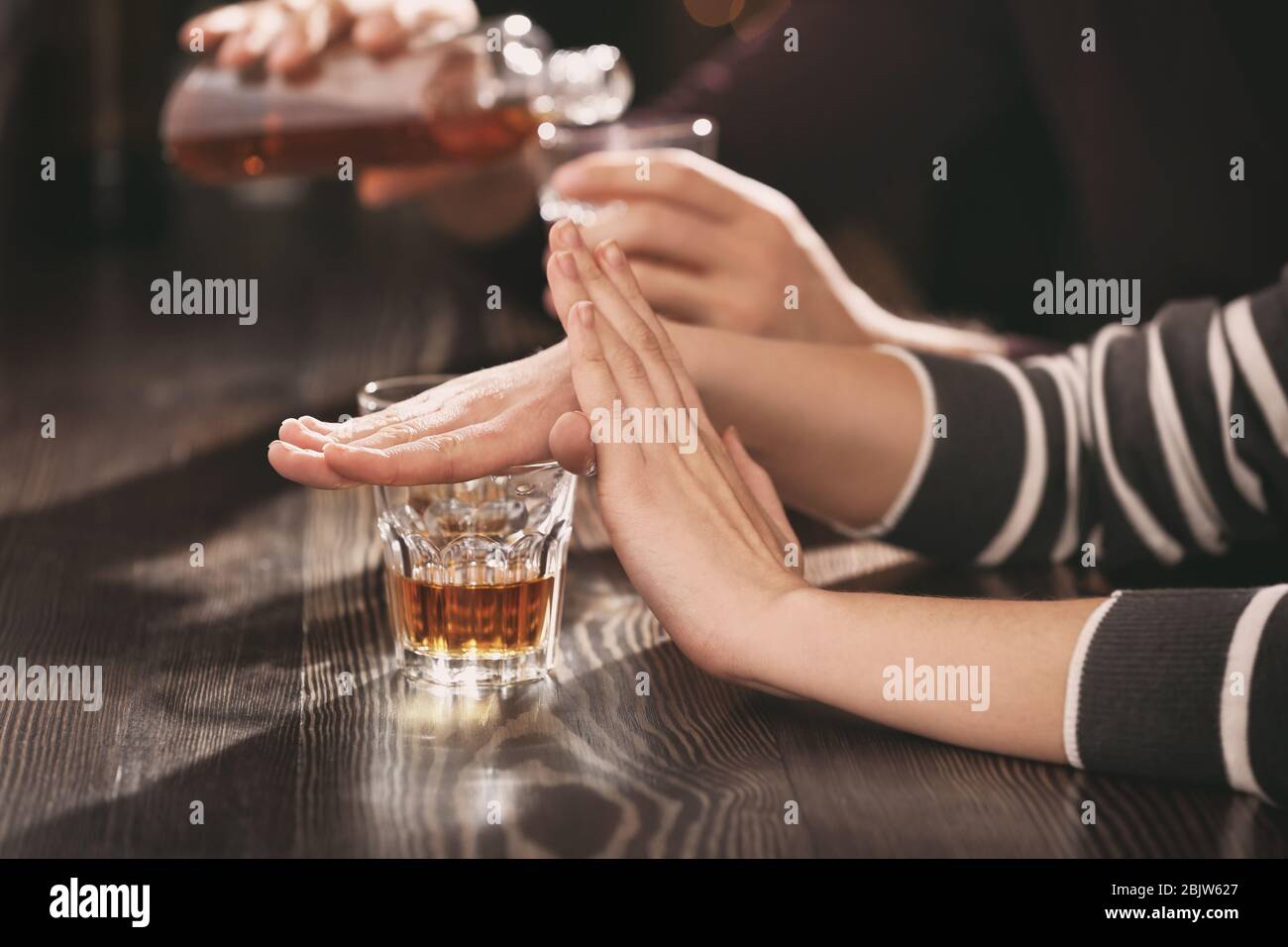 Woman rejecting man at bar hi-res stock photography and images - Alamy