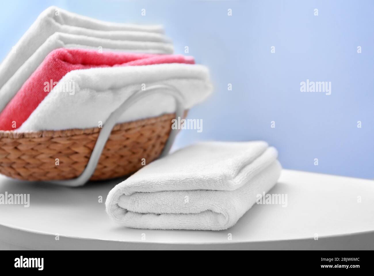 Clean soft towels on table Stock Photo - Alamy