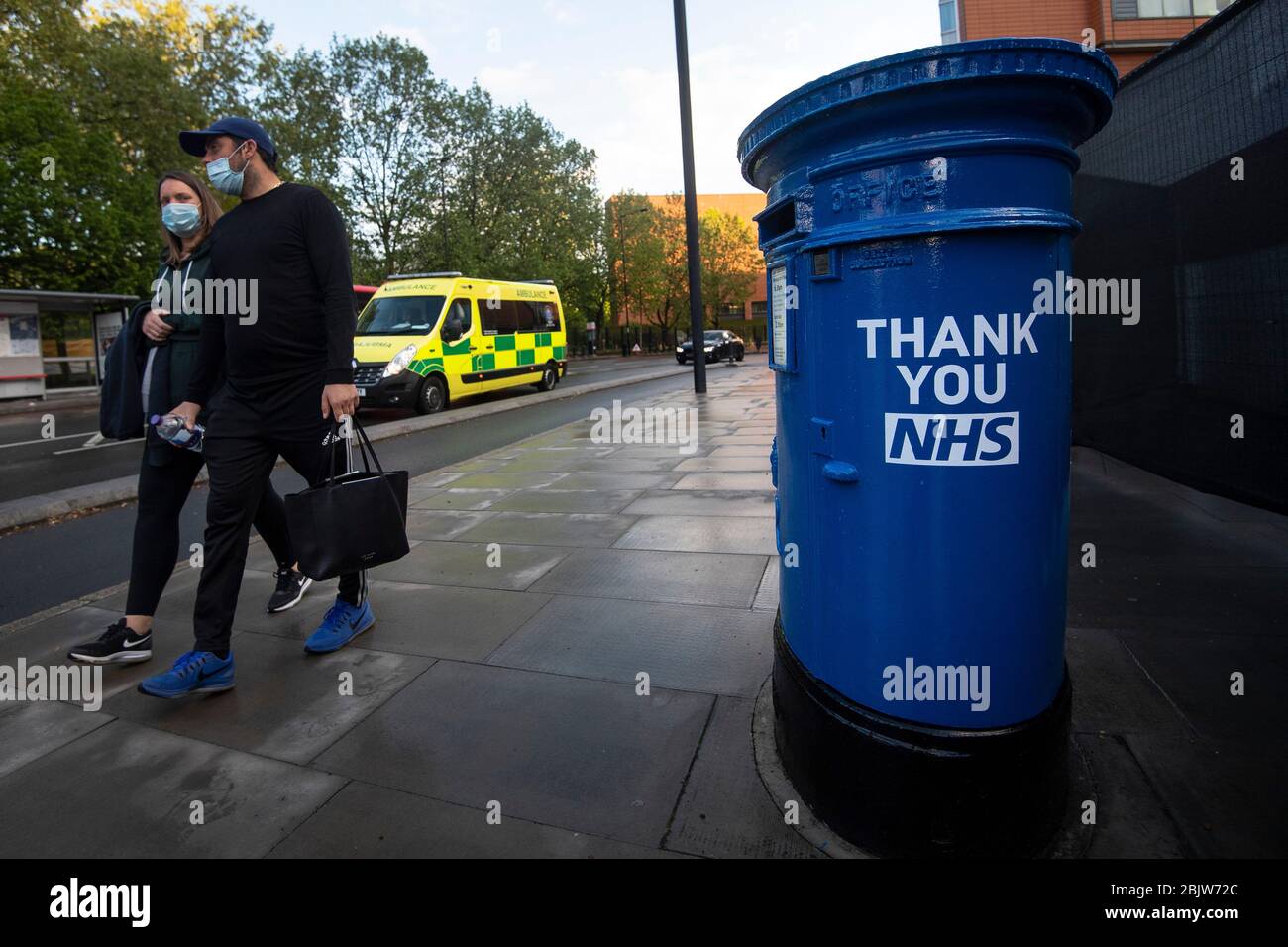 A blue postbox in support of the NHS outside St Thomas's Hospital in ...
