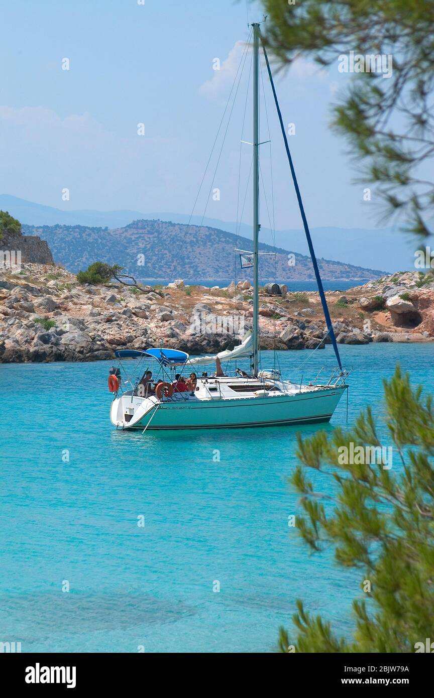 Yacht moored in an idyllic and picturesque spot off Aponisos Beach on ...