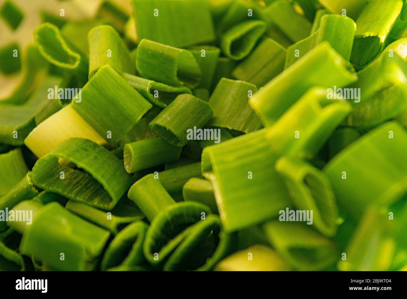 Sliced green onions, the texture of the surface. Close up. Background ...