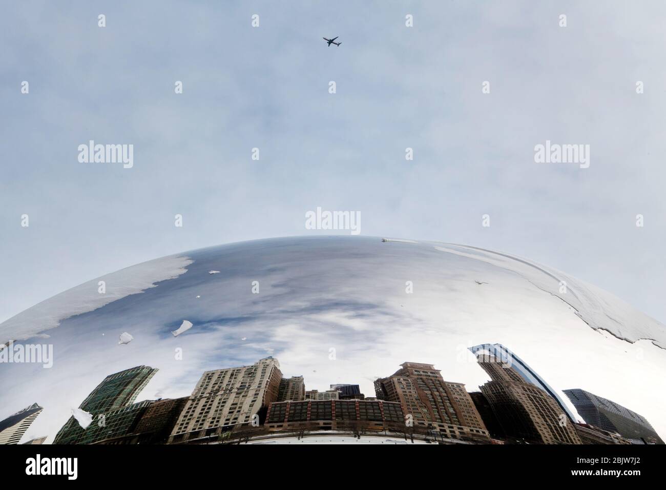 CHICAGO - January 7: The Cloud Gate also known as the Bean covered in ...