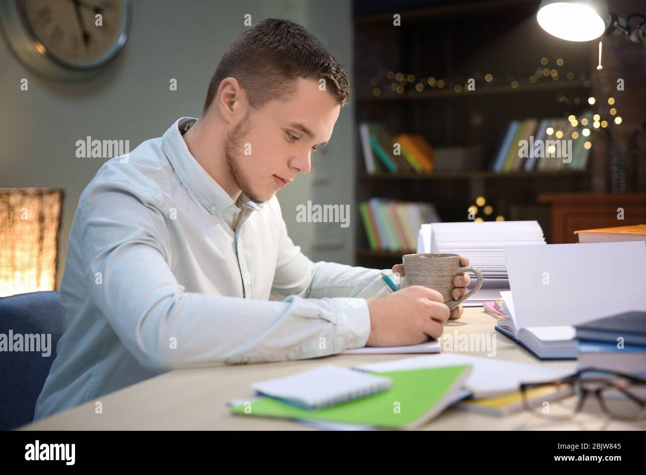 Male student study late night hi-res stock photography and images - Alamy