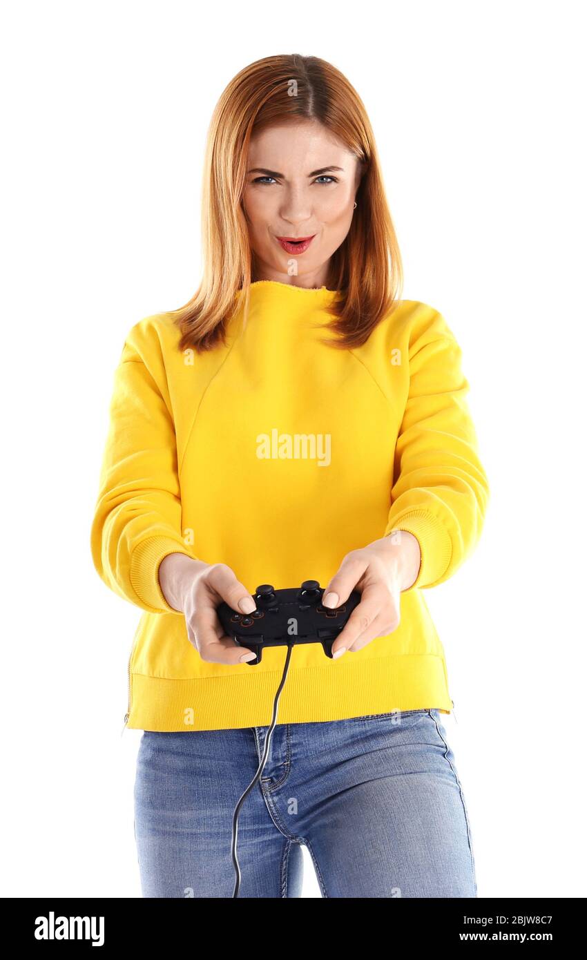 Emotional woman with video game controller on white background Stock ...
