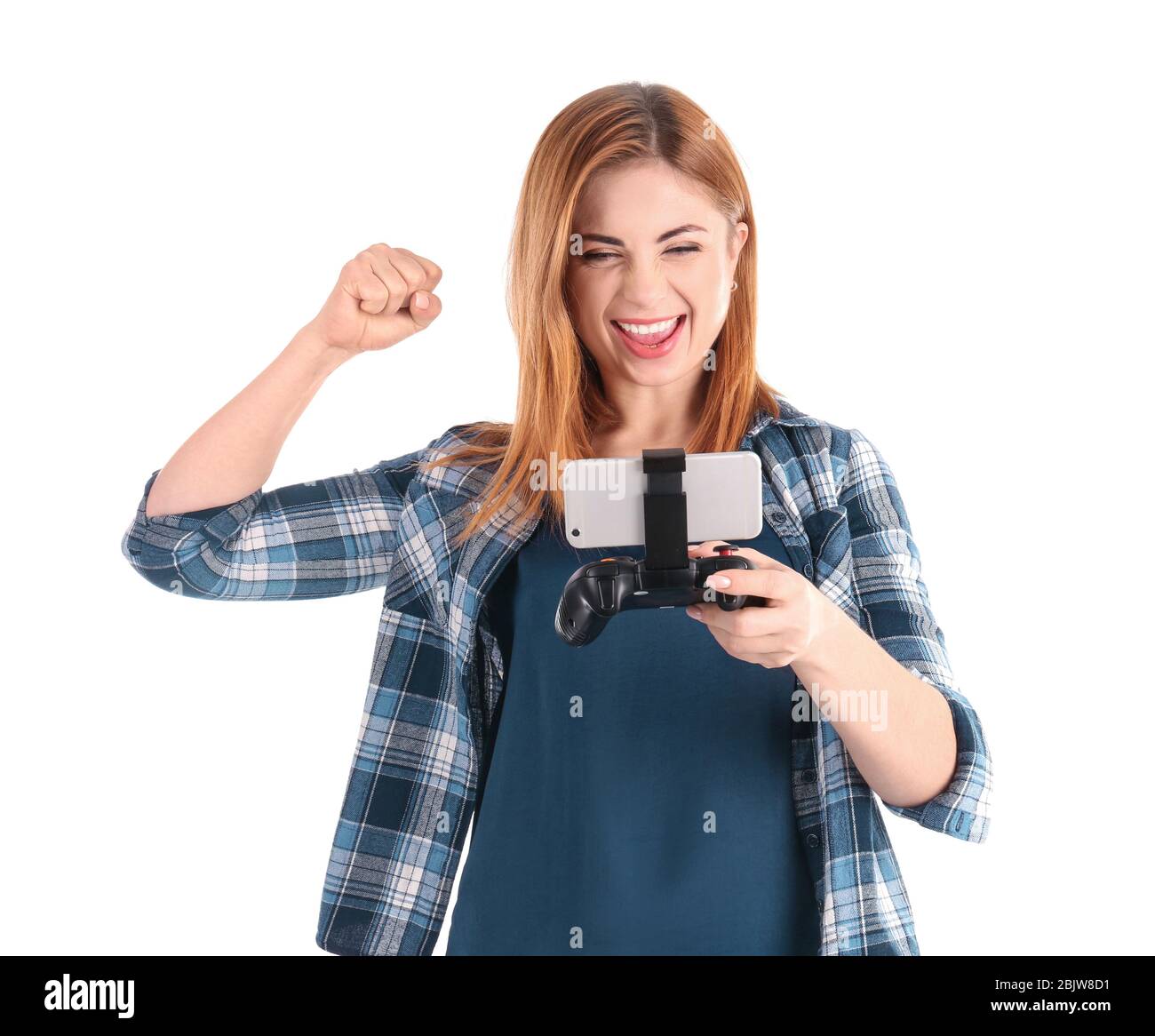Emotional woman with video game controller for smartphone on white ...