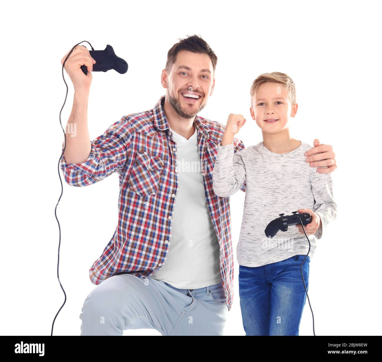 Happy man and his son with video game controllers on white background ...
