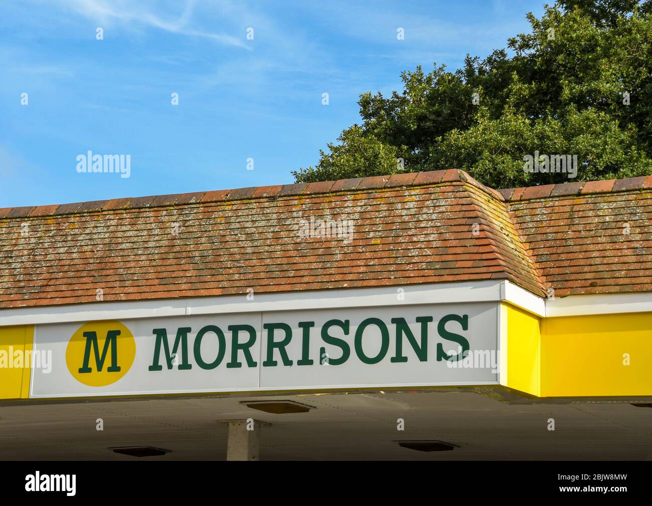 CARDIFF, WALES - AUGUST 2018: Large sign above a Morrisons petrol ...
