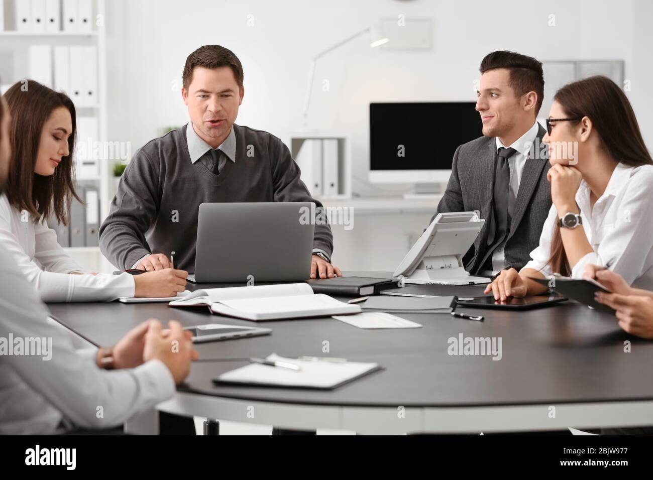 Group of people with business trainer at management seminar Stock Photo ...