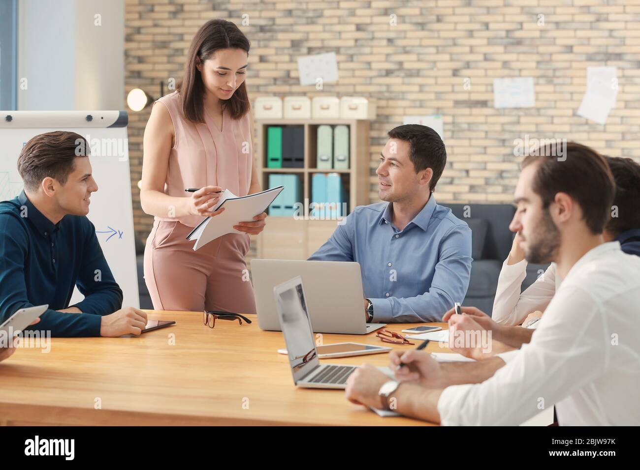 Group of people with business trainer at management seminar Stock Photo ...