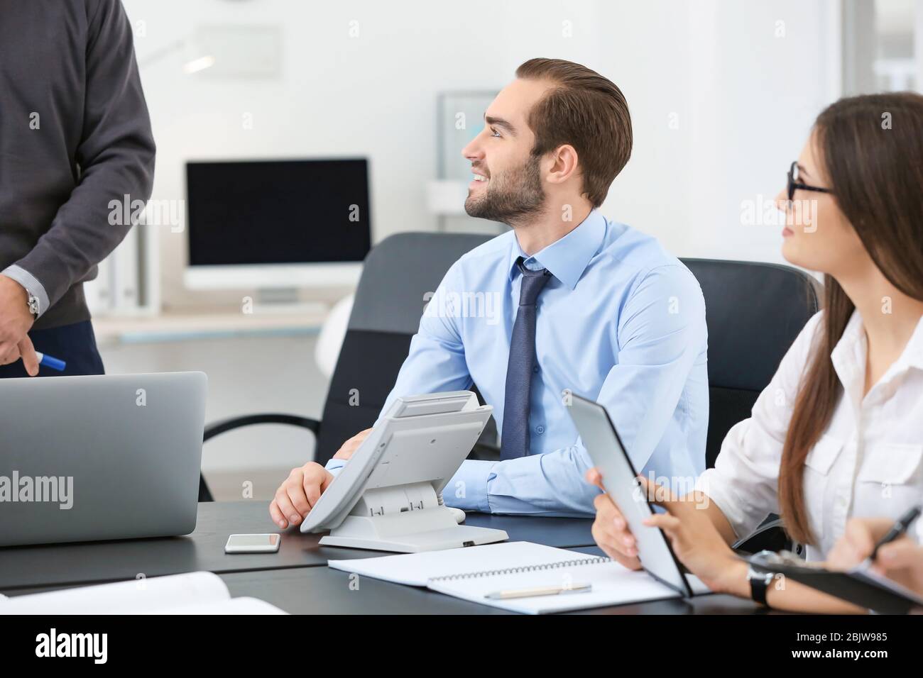 Group of people at management seminar Stock Photo - Alamy