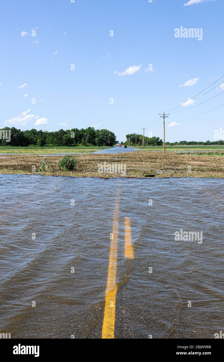 Flooded street in rural highway through farm land Stock Photo - Alamy