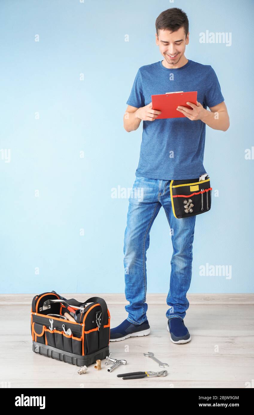 Plumber plunger tool belt hi-res stock photography and images - Alamy