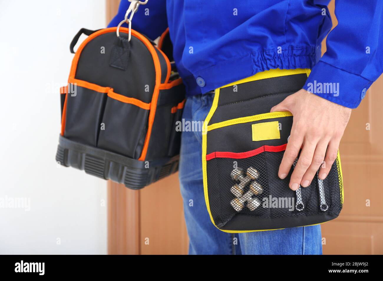 Plumber plunger tool belt hi-res stock photography and images - Alamy
