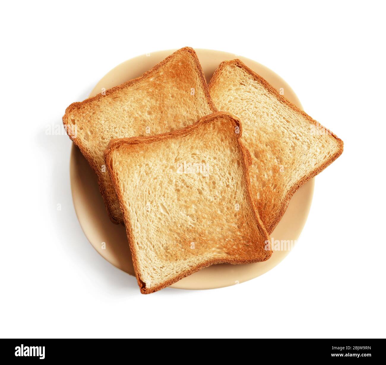 Plate with toasted bread on white background Stock Photo - Alamy