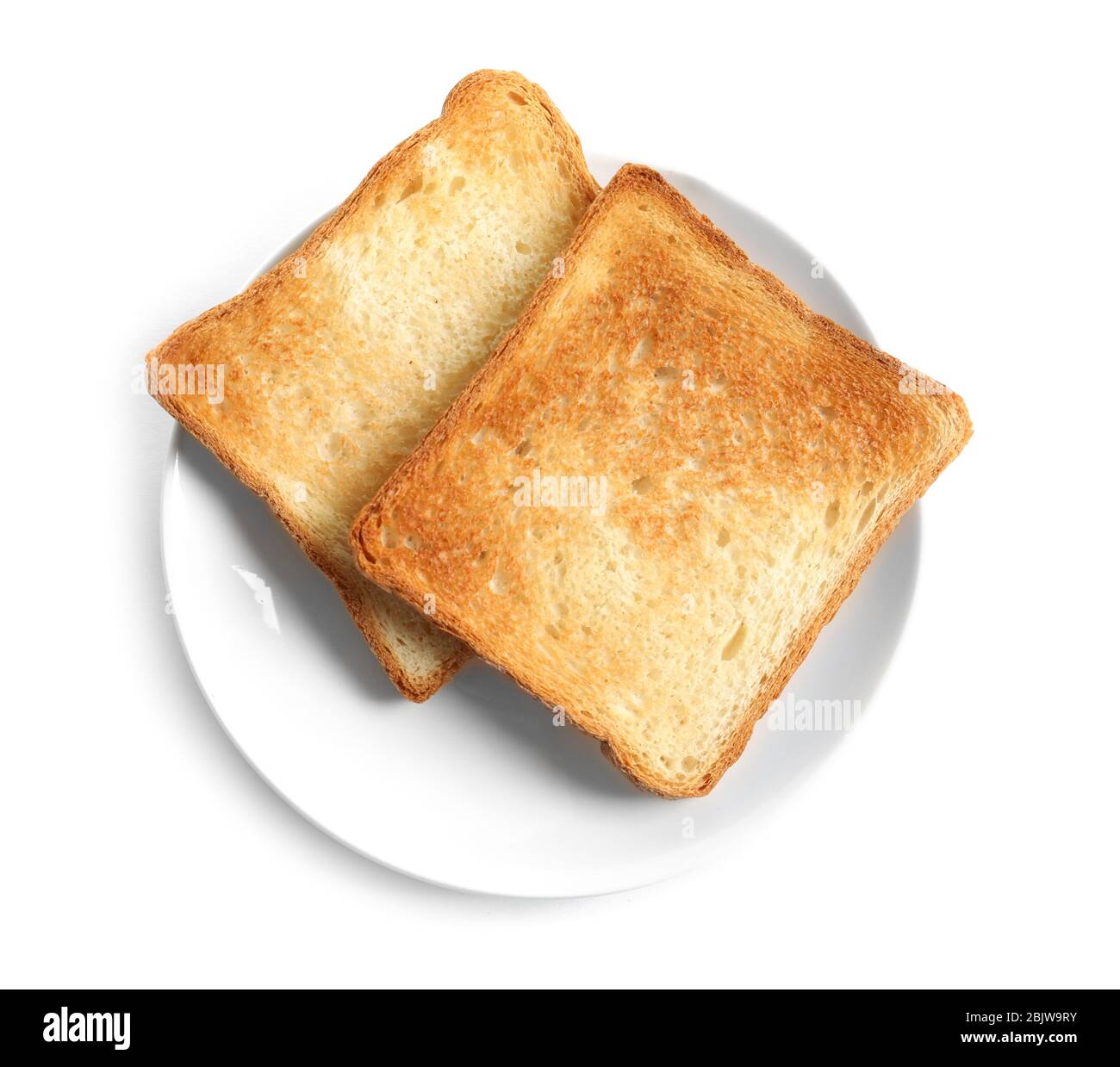 Plate with toasted bread on white background Stock Photo - Alamy