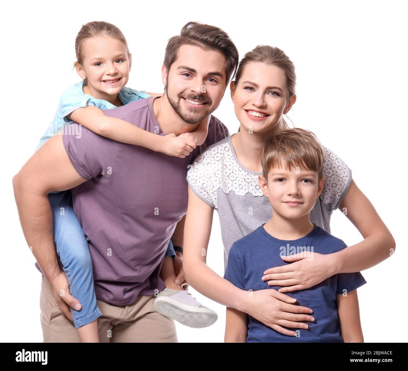 Portrait of couple with children on white background. Happy family ...