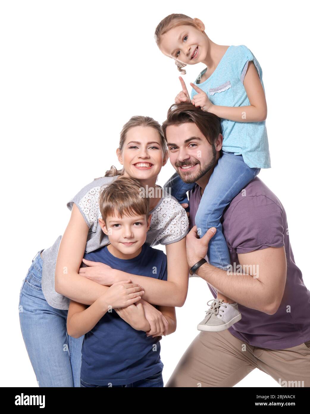 Portrait of couple with children on white background. Happy family ...