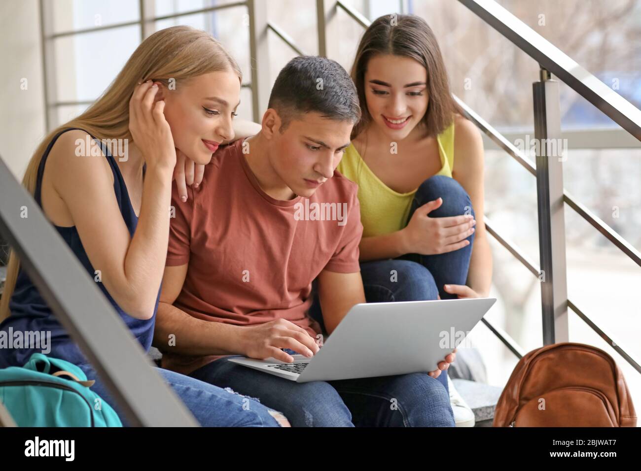 Students finding out their grades for exam indoors Stock Photo - Alamy