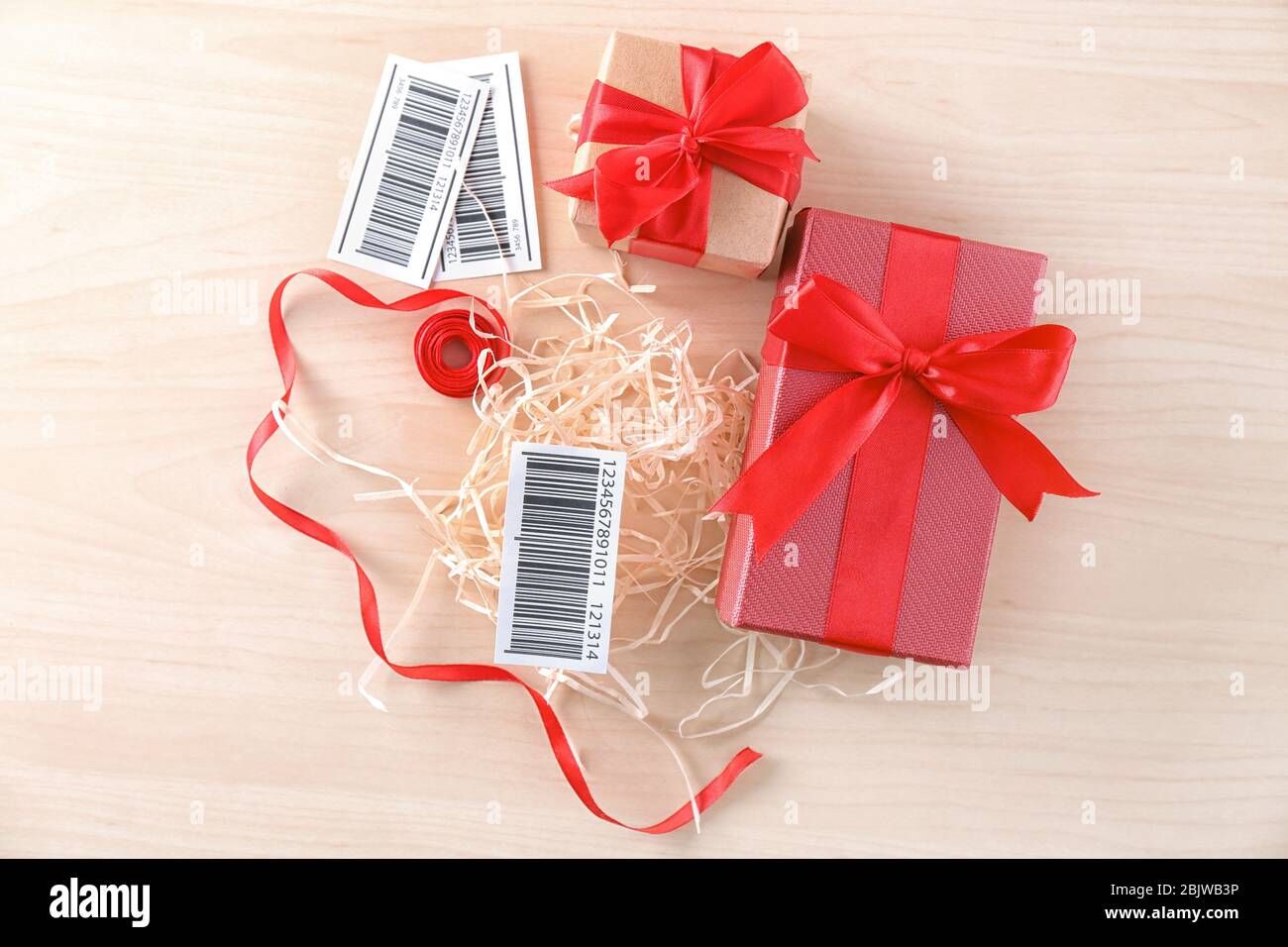 Composition with parcel gift boxes on wooden background Stock Photo - Alamy