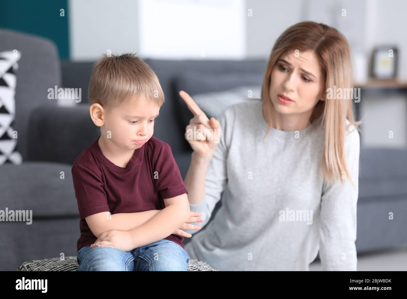 Mother scolding her little son at home Stock Photo - Alamy