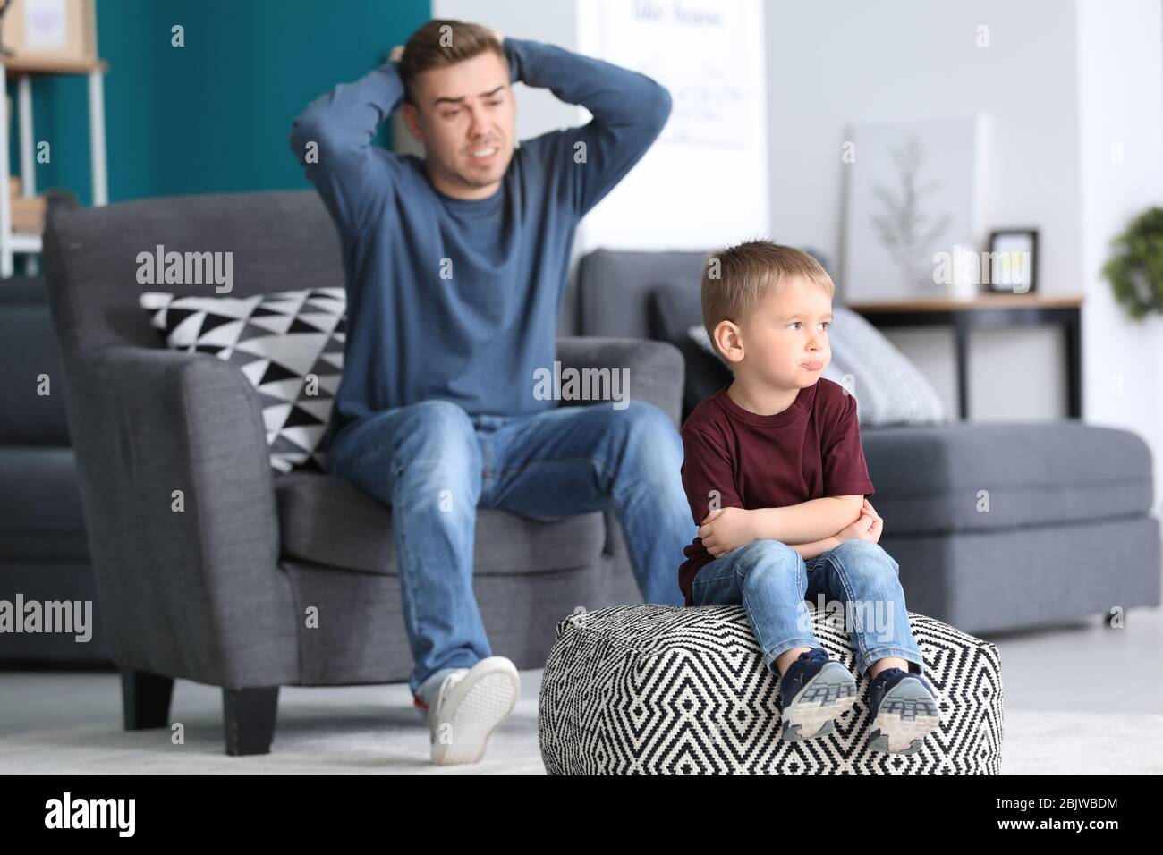 Father scolding his little son at home Stock Photo - Alamy
