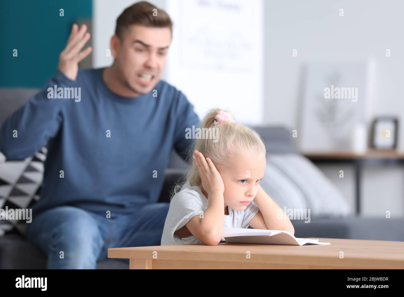 Father scolding his little daughter at home Stock Photo - Alamy