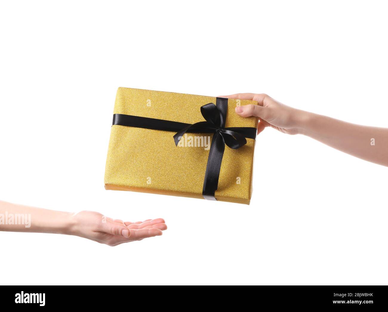 Woman receiving gift box from her friend on white background Stock ...