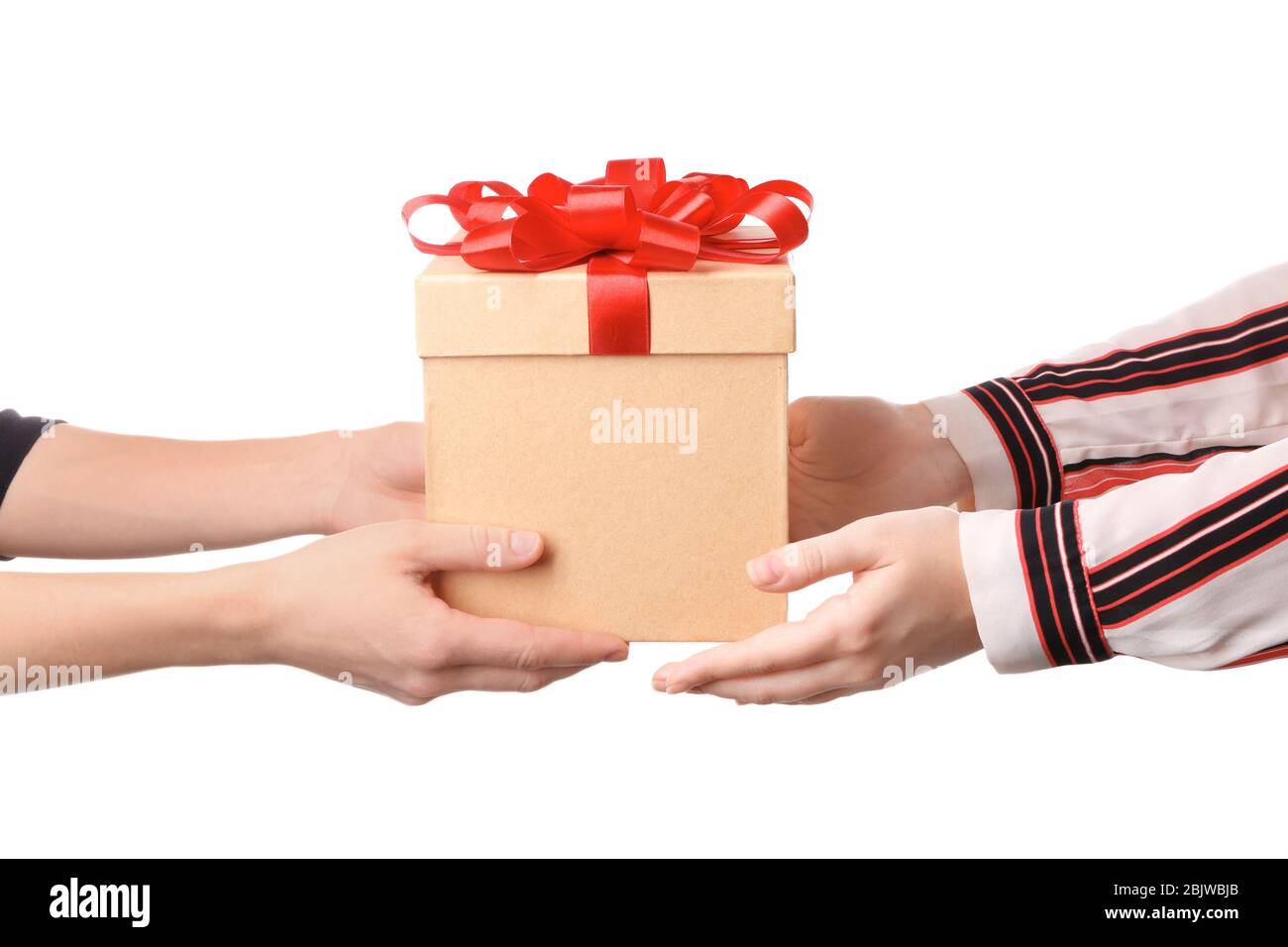 Woman receiving gift box from her friend on white background Stock ...