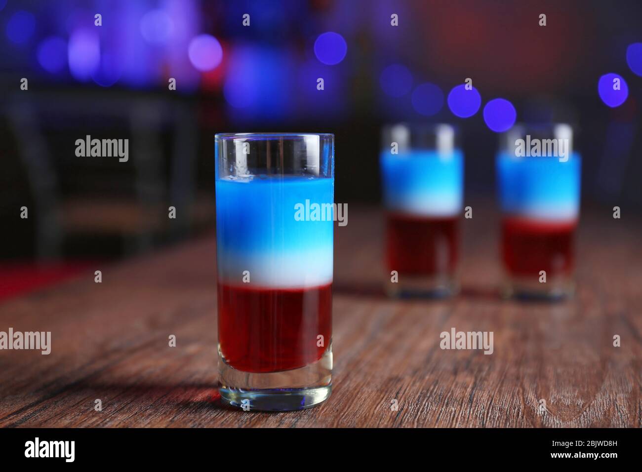 Layered patriotic drink on table. American flag cocktail Stock Photo ...
