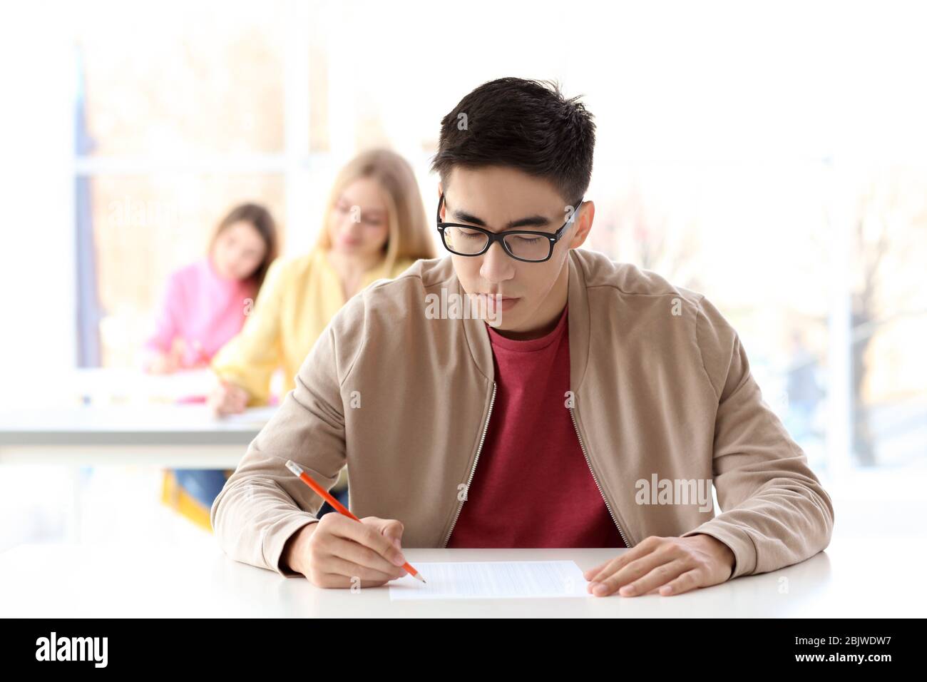 Taking sheet paper classroom hi-res stock photography and images - Alamy