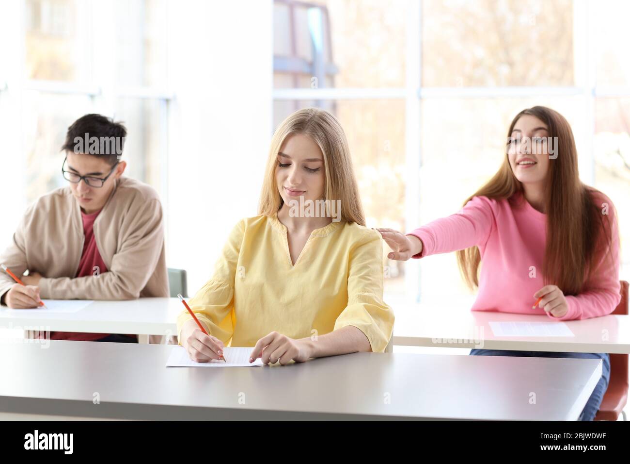 Classmate exams hi-res stock photography and images - Alamy