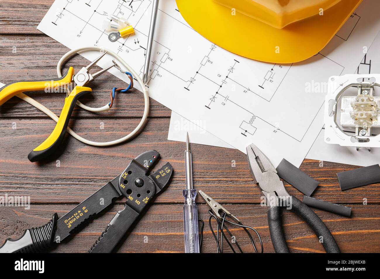 Different electrical tools on wooden background Stock Photo - Alamy