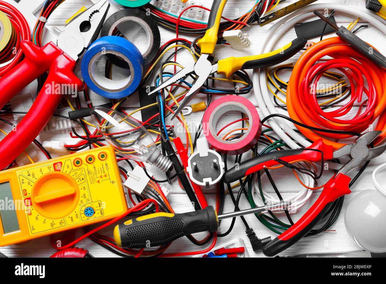 Different electrical tools on table Stock Photo - Alamy