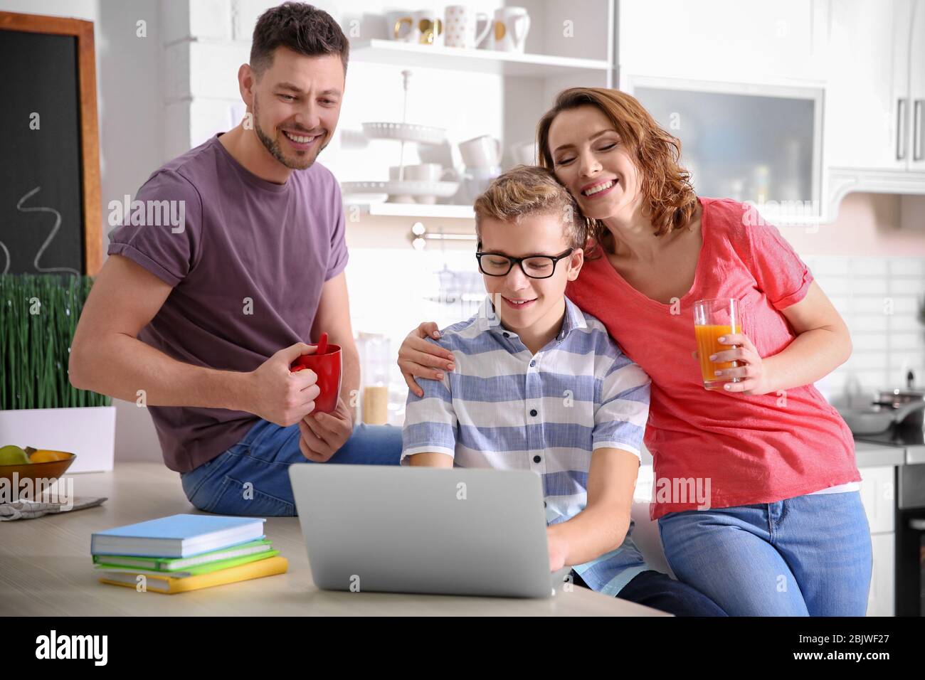 Parents child homework glasses hi-res stock photography and images - Alamy