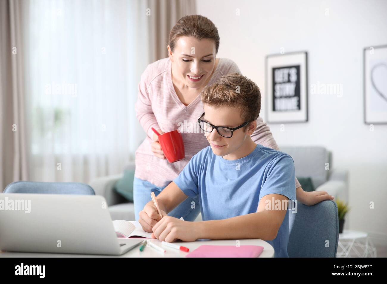 Caucasian mother son doing school hi-res stock photography and images - Alamy