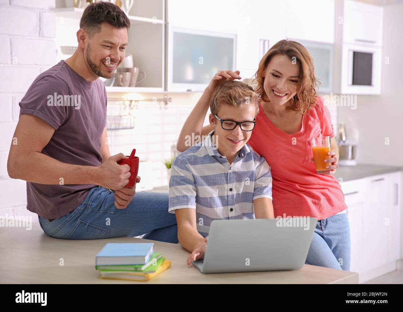 Parents child homework glasses hi-res stock photography and images - Alamy