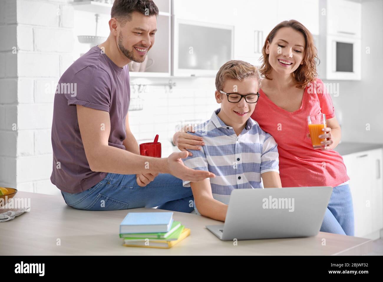 Parents child homework glasses hi-res stock photography and images - Alamy