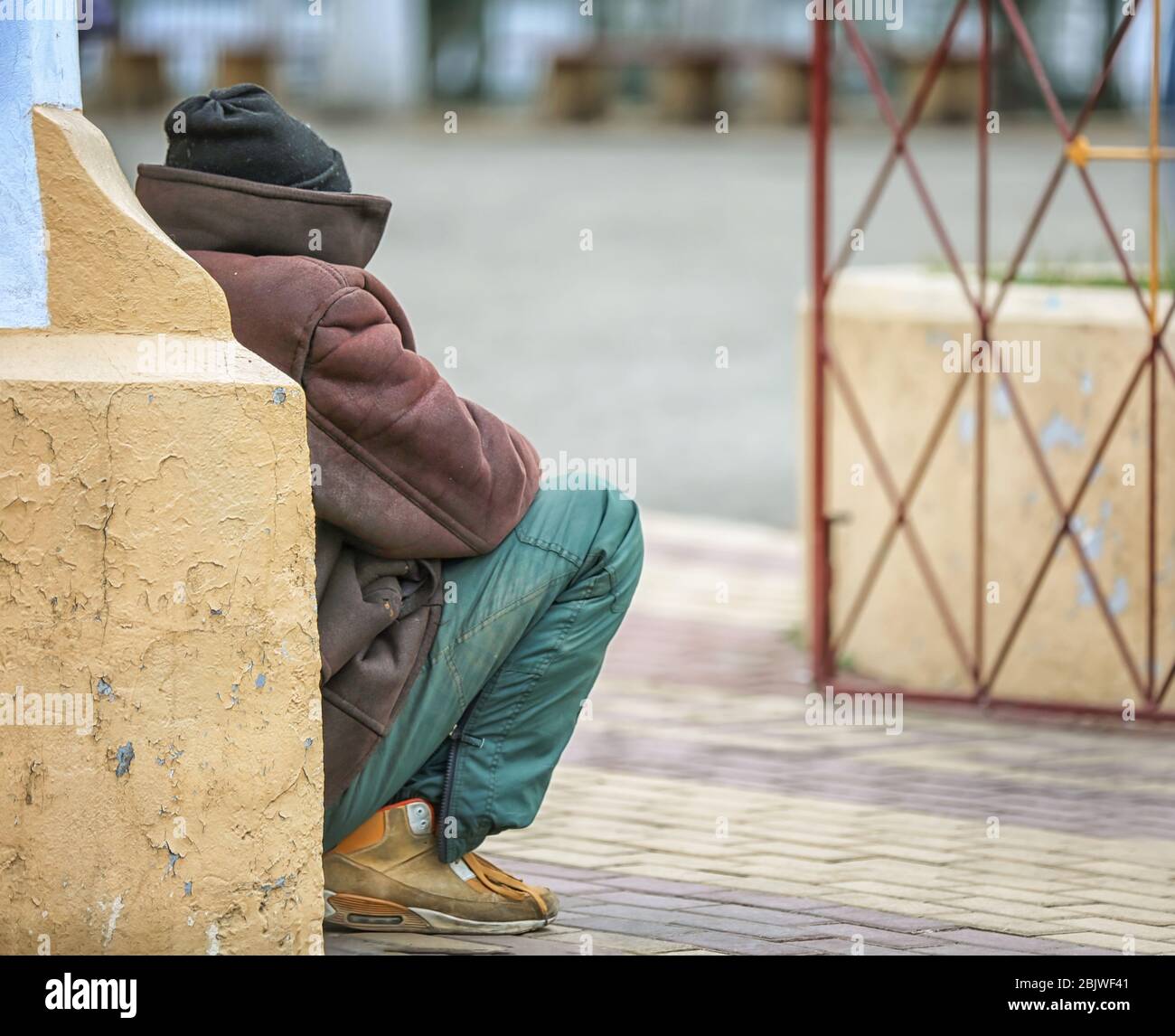 Poor man begging for money on street Stock Photo - Alamy