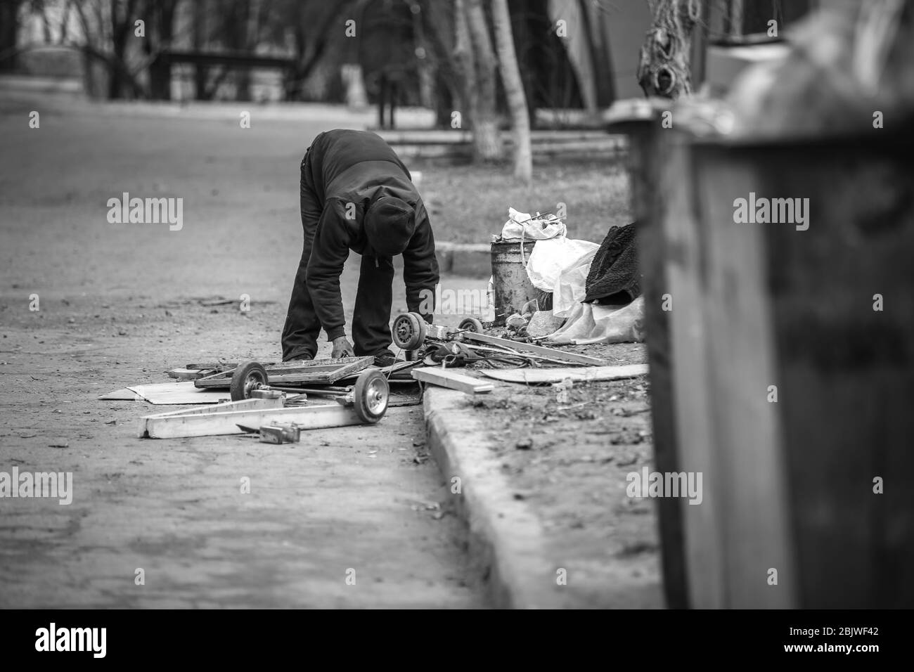 Poor rummaging in the garbage hi-res stock photography and images - Alamy