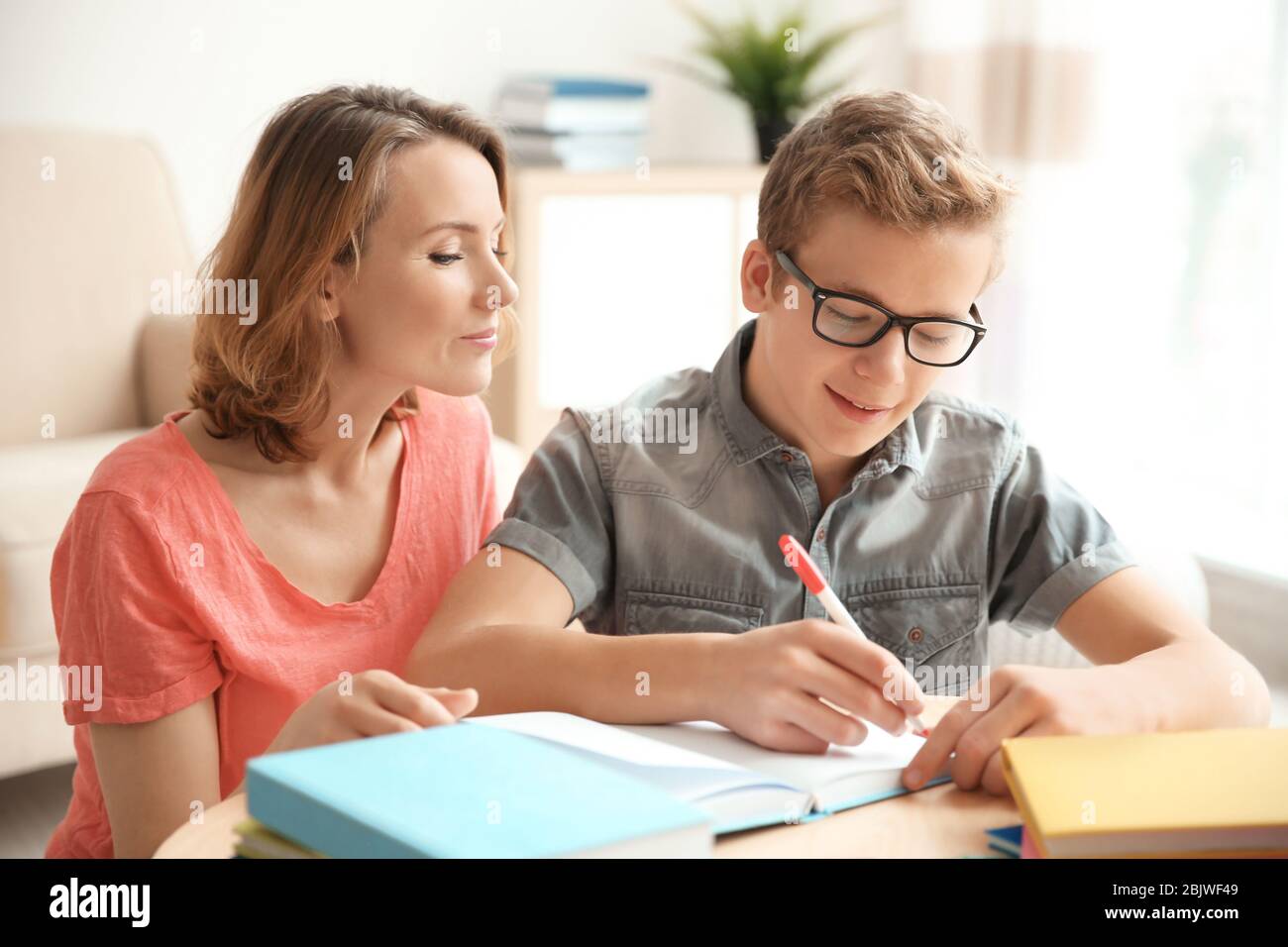 Mother and kid glasses studying hi-res stock photography and images - Alamy