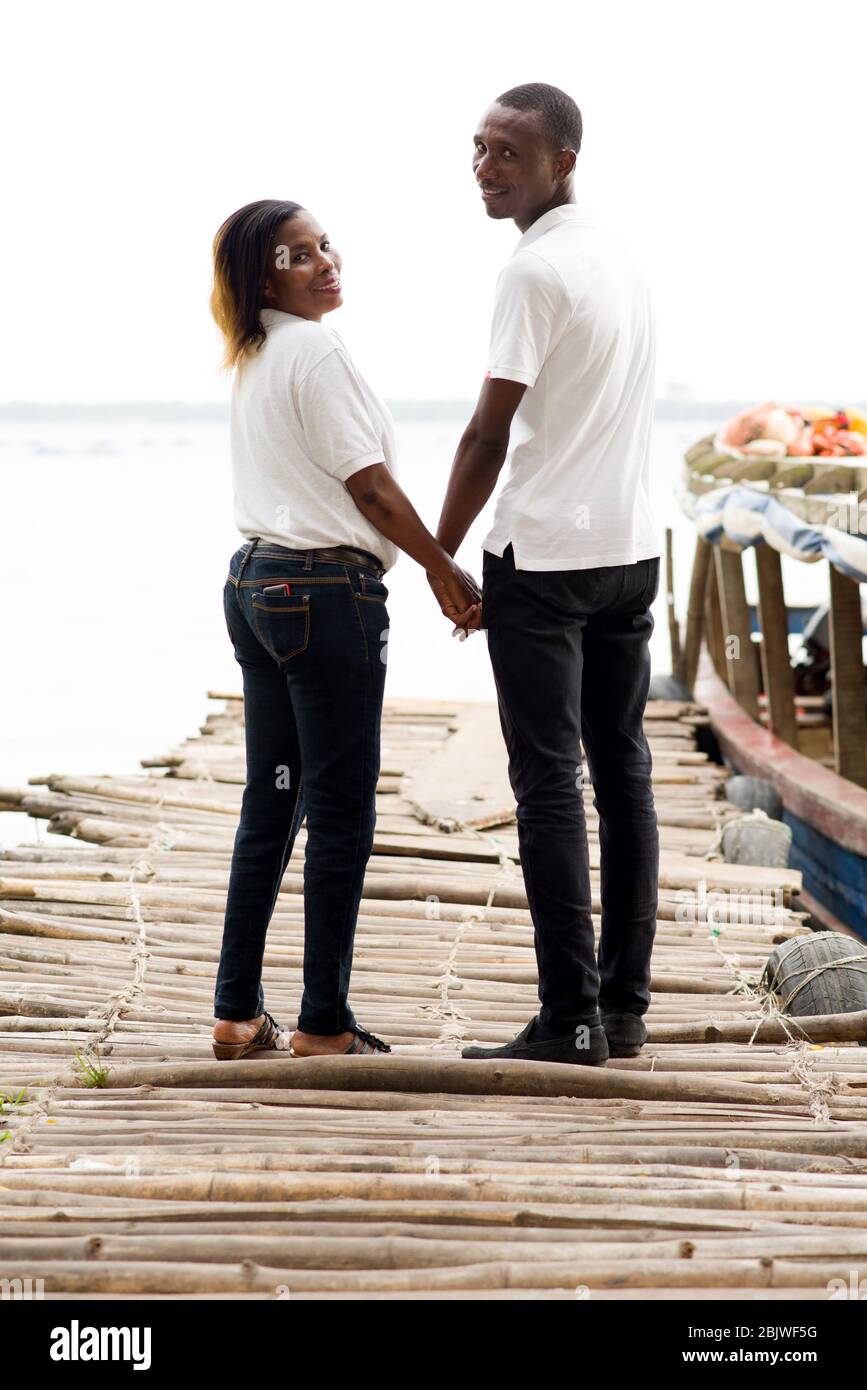 Young couple on edge kissing hi-res stock photography and images - Alamy