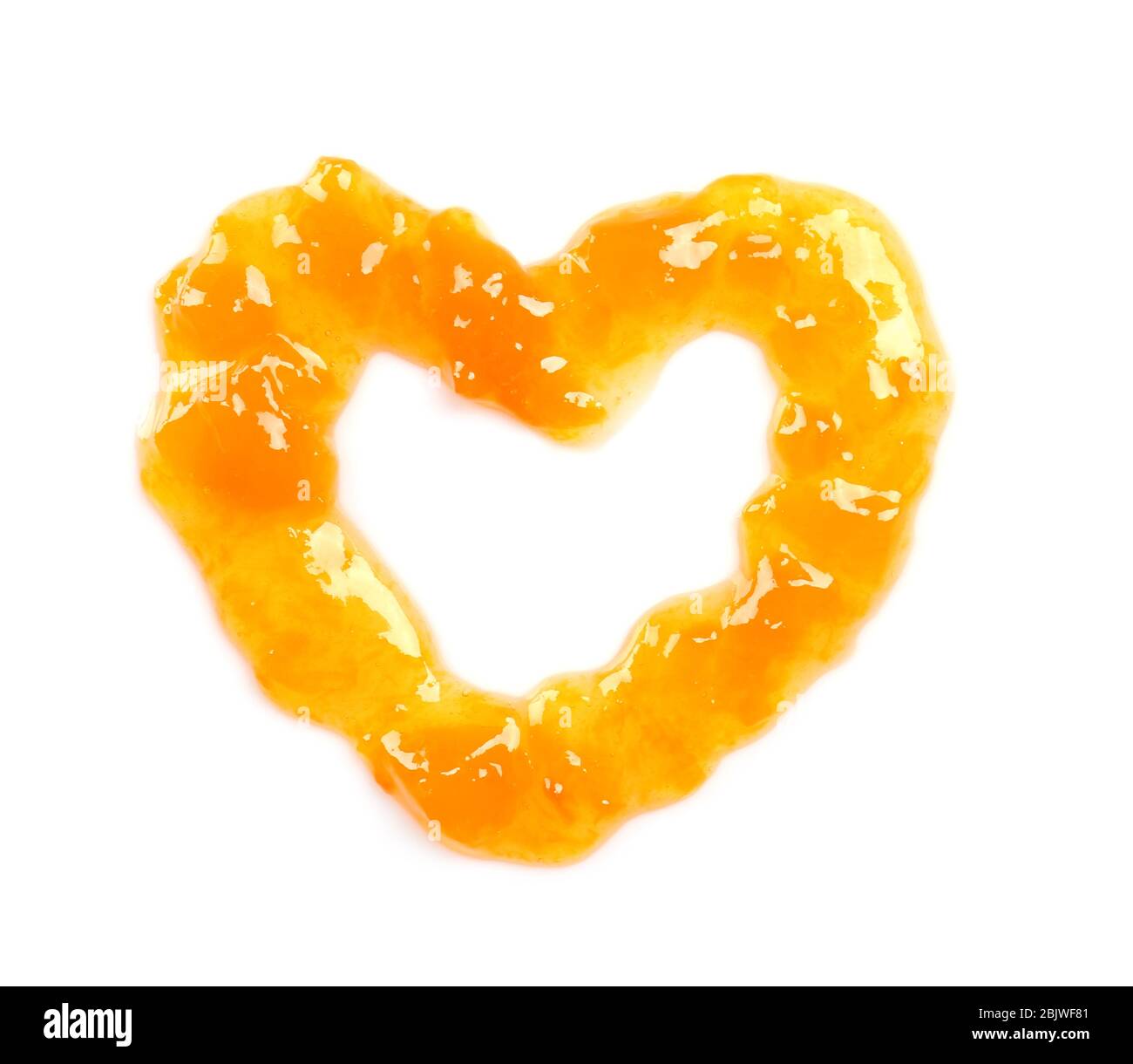 Heart shape made of sweet jam on white background Stock Photo - Alamy