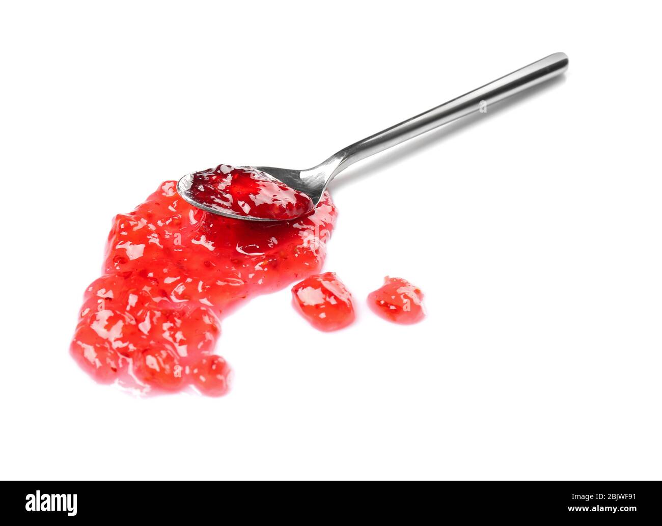 Spoon with sweet jam on white background Stock Photo - Alamy