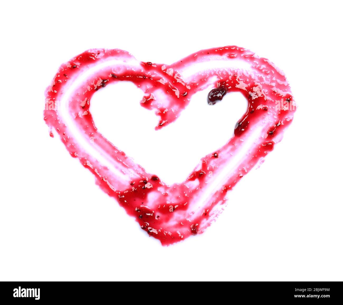 Heart shape made of sweet jam on white background Stock Photo - Alamy