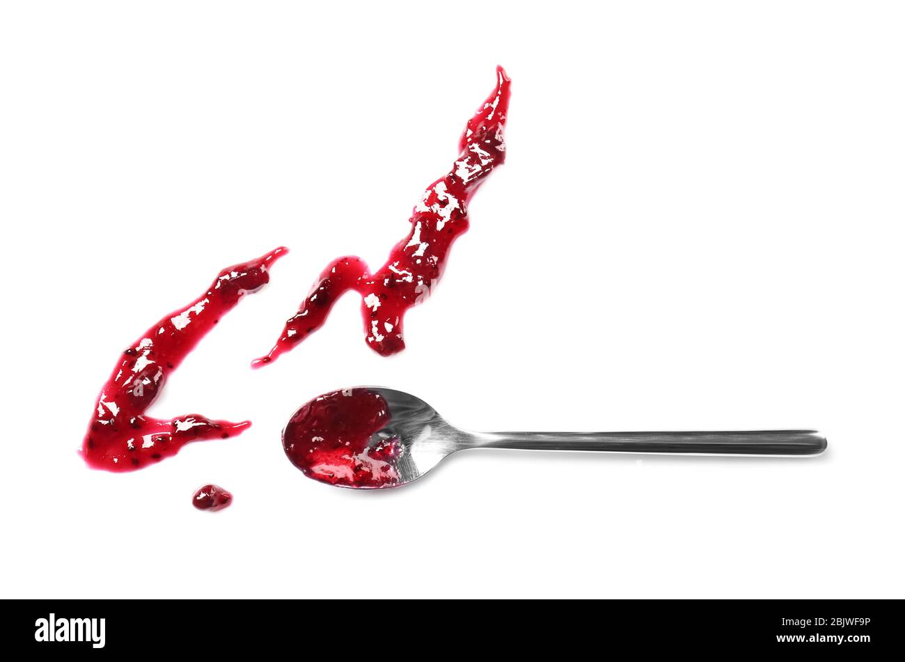 Spoon with sweet jam on white background Stock Photo - Alamy