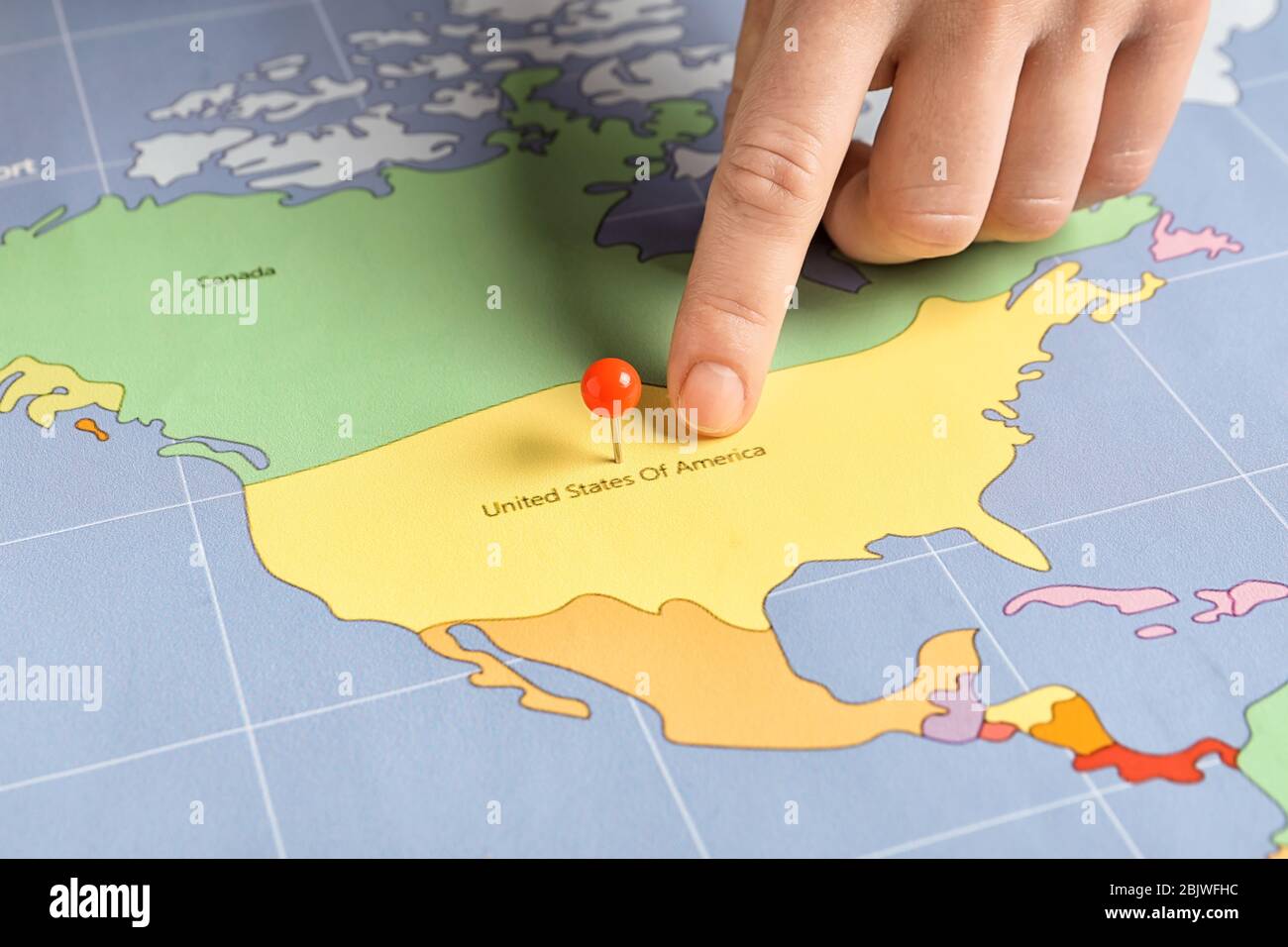 Pointing on map hi-res stock photography and images - Alamy