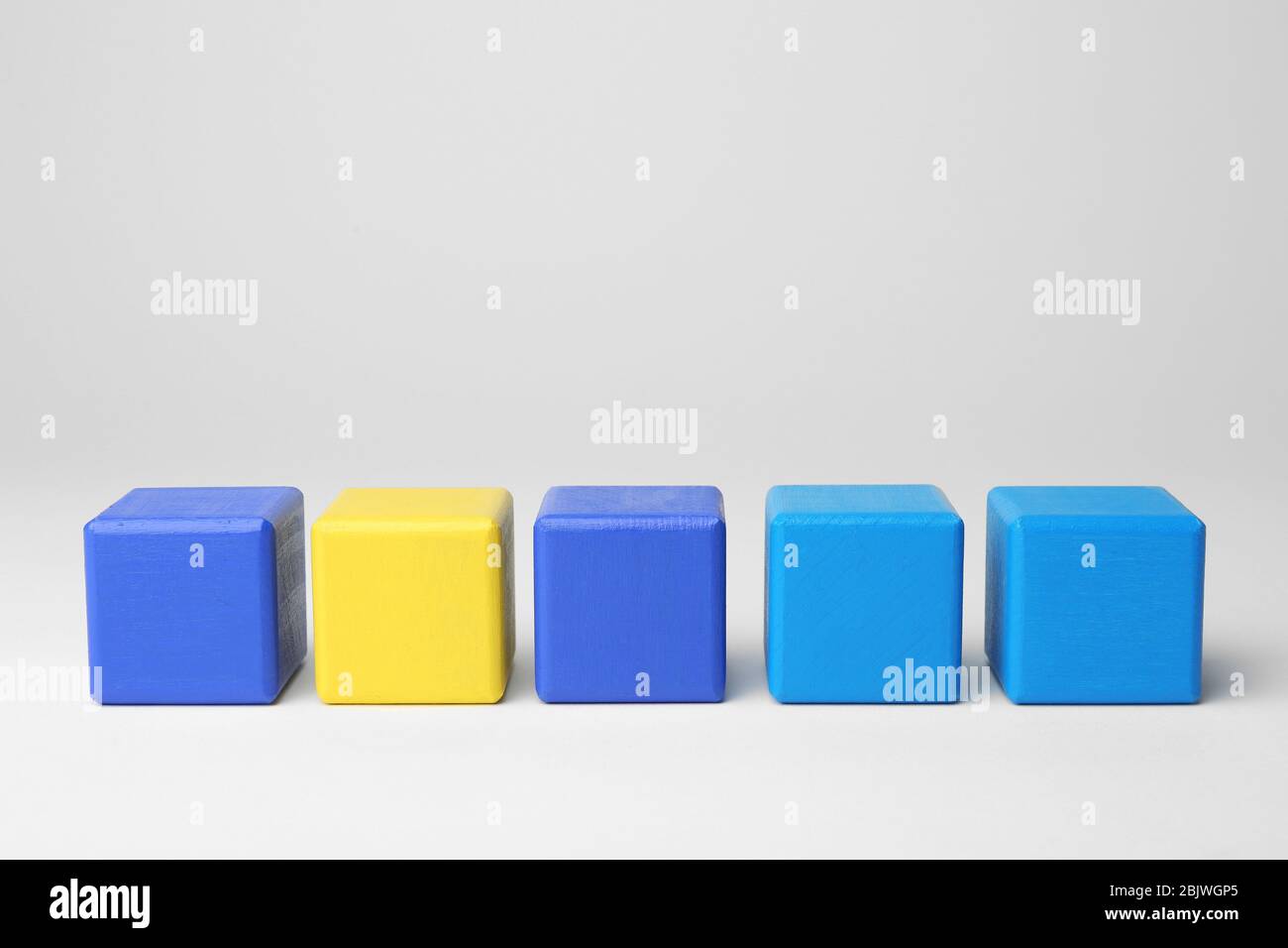 Different cubes on white background Stock Photo - Alamy
