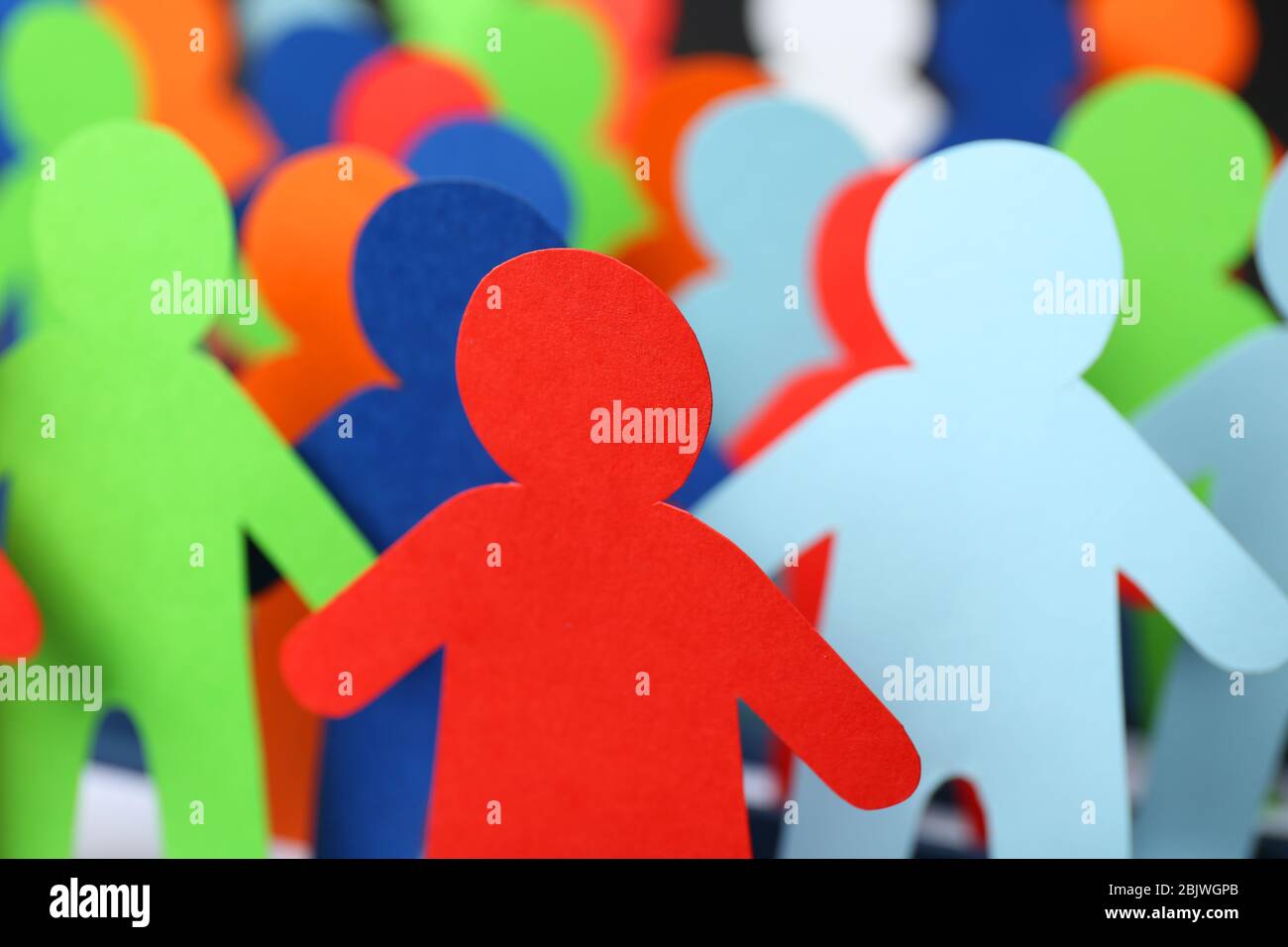 Different paper human figures, closeup Stock Photo - Alamy