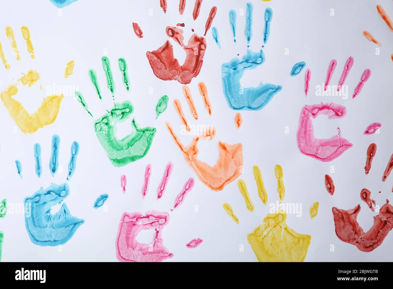 Different palm prints on white background Stock Photo - Alamy